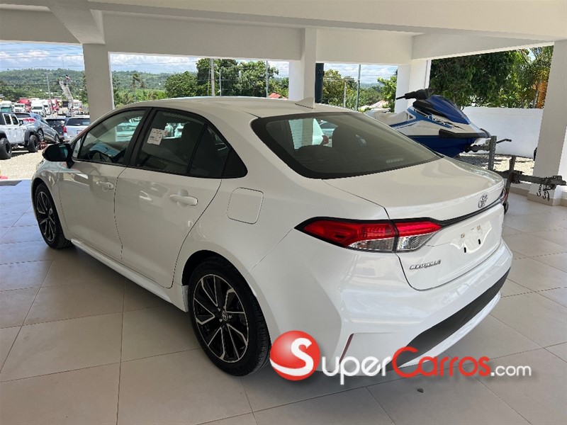 Toyota Corolla LE 2020 #1346940 - SuperCarros.com